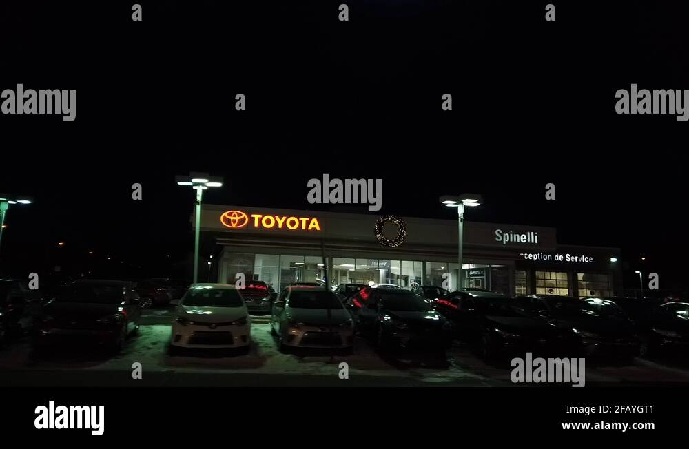 Toyota car dealership display on a winter night Stock Video Footage - Alamy