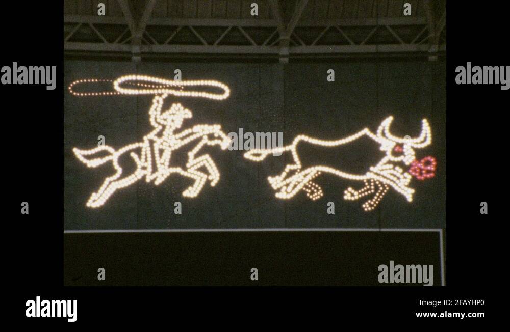 1960s: Pan across scoreboard, animated lights on scoreboard Stock Video ...