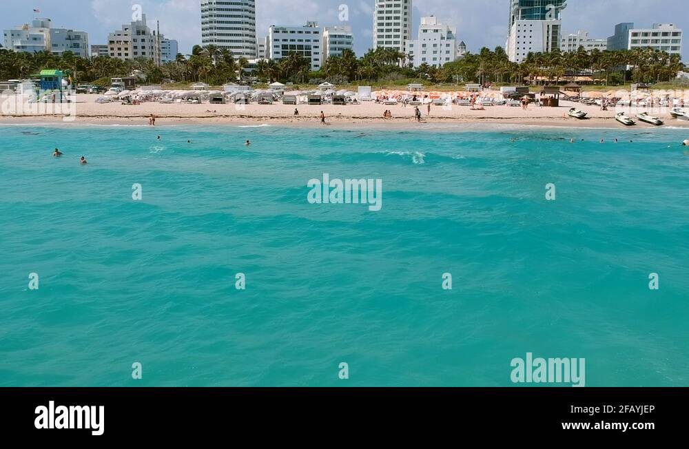 Beach goers in the water Stock Videos & Footage - HD and 4K Video Clips ...