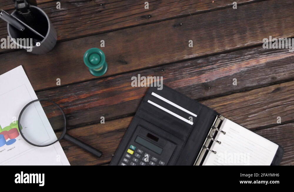 Crane lift, top view modern wooden desk work table with chart and ...