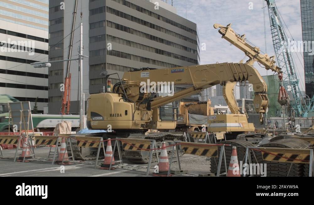 Hydraulic Excavator working on construction site in Tokyo, Japan Stock ...