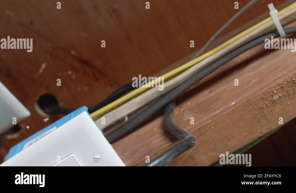 Electrical Outlet with Wires on Basement Ceiling ROTATE LEFT Stock ...