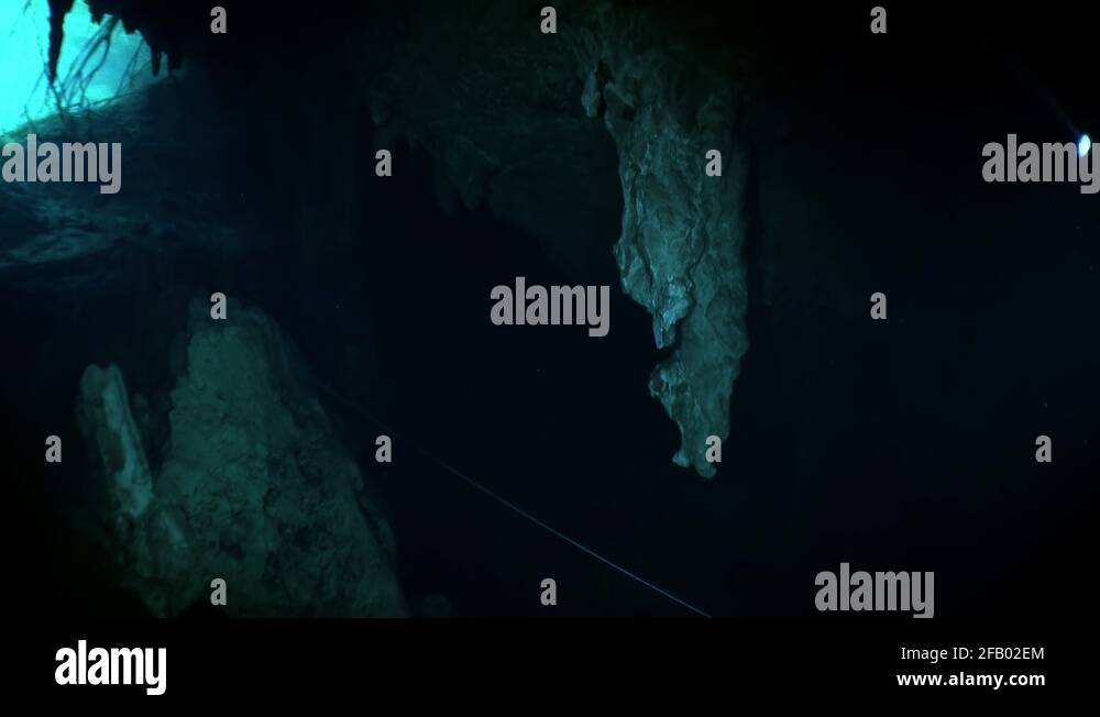 Cave diving in underground water of underwater Yucatan Mexico cenotes ...