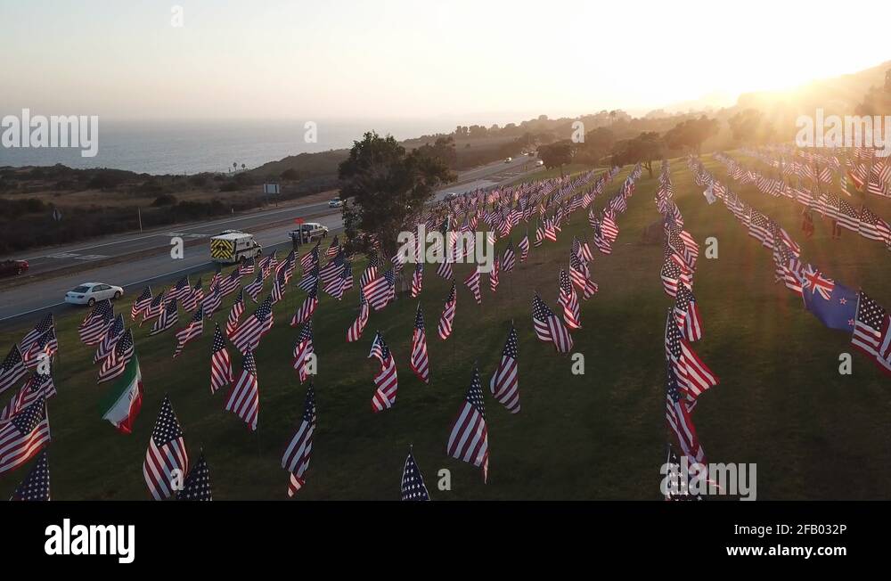 American Flags Still near highway PCH Sunset captured by Drone in ...