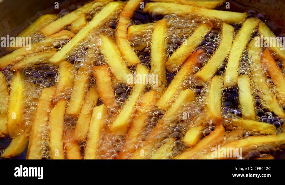 Golden french fries Stock Videos & Footage - HD and 4K Video Clips - Alamy