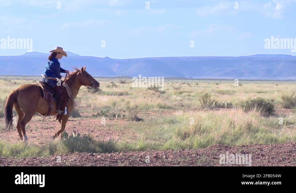 Rancher Riding Horse Across Rough Terrain Of West Texas 4k Stock Video ...