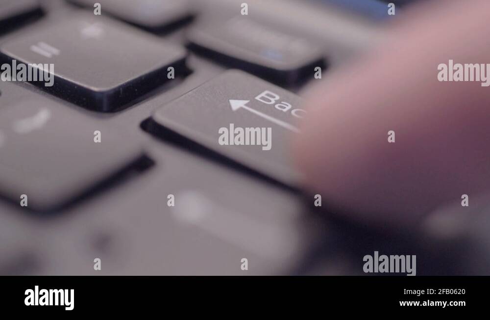 Pressing backspace key on a laptop Stock Video Footage - Alamy