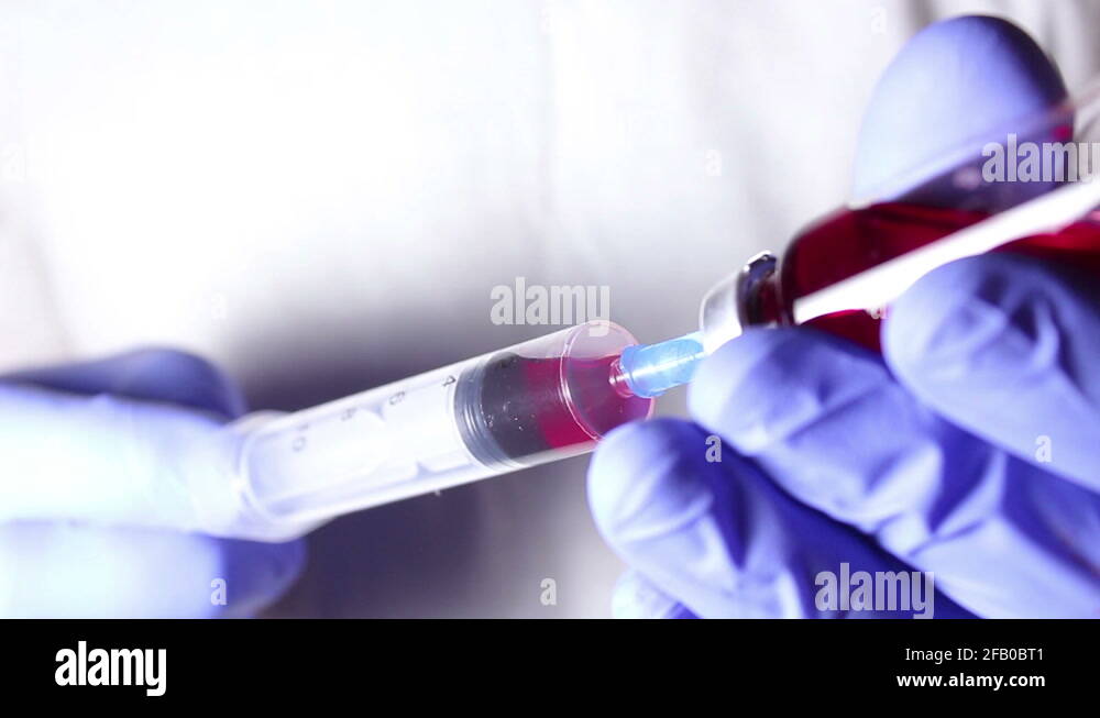 Syringe with red injection Stock Videos & Footage - HD and 4K Video ...