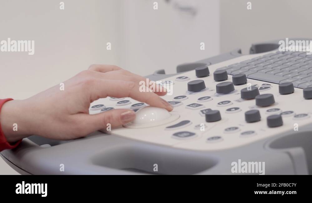 Ultrasonography process close up and female hand using equipment Stock ...