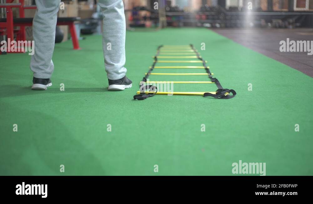 Man ladder gym Stock Videos & Footage - HD and 4K Video Clips - Alamy