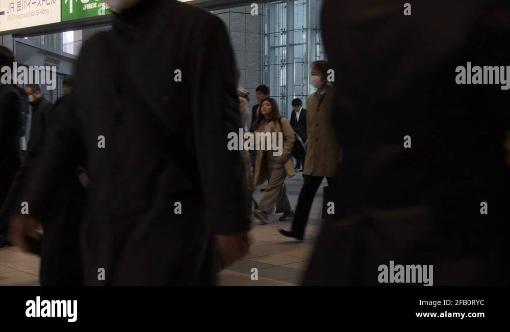 Commuter Crowd at Shinagawa Railway Station Stock Video Footage - Alamy