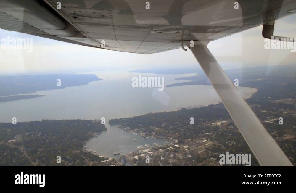 Looking out Window at Wing in Old Cessna 182 Airplane at Charlevoix ...