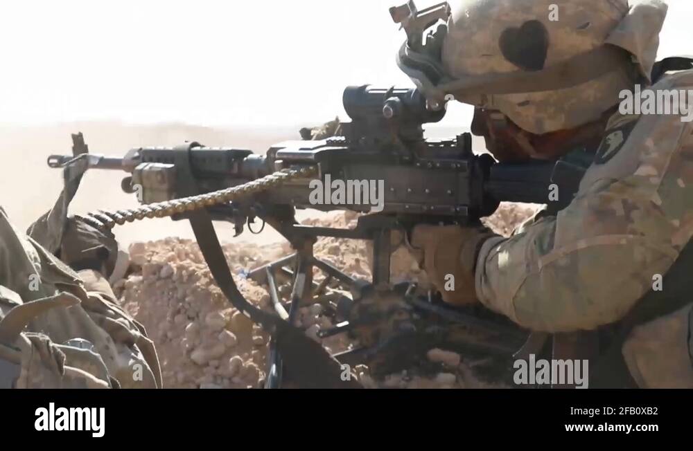 Soldier firing machine gun during exercise African Lion Stock Video ...