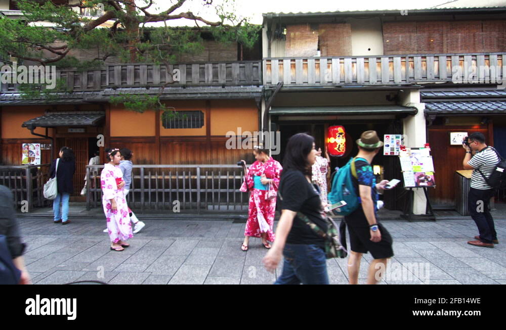 People on Hanami street in old quarter of geisha Gion in Kyoto Japan ...