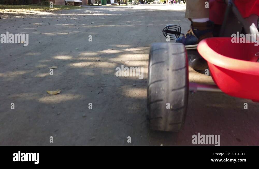 Baby riding tricycle Stock Videos & Footage - HD and 4K Video Clips - Alamy