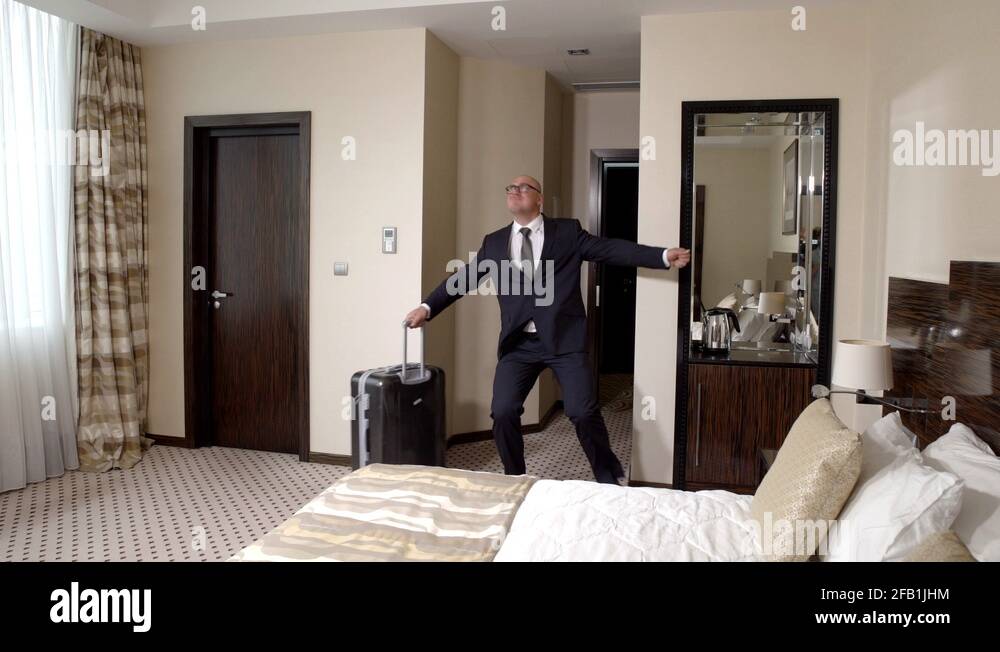 Man hotel room bald Stock Videos & Footage - HD and 4K Video Clips - Alamy