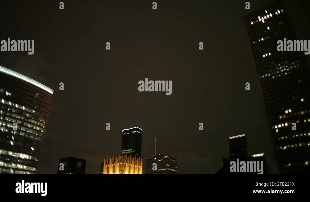 tilt down night downtown scene Stock Video Footage - Alamy