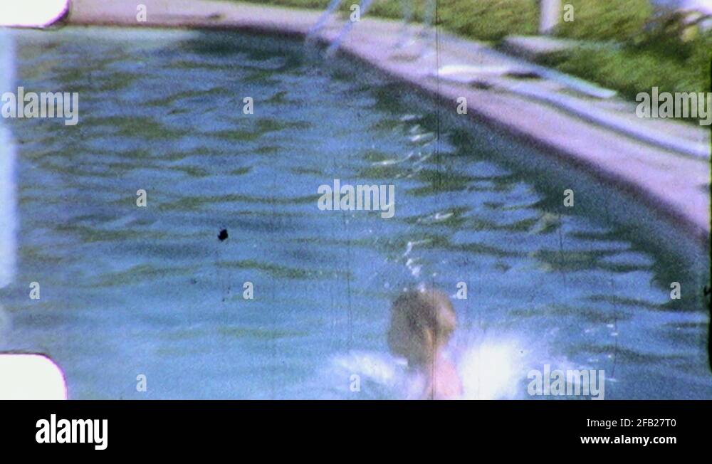 Little Blond Boy Jumps into Swimming Pool 1960s Vintage Film Home Movie ...