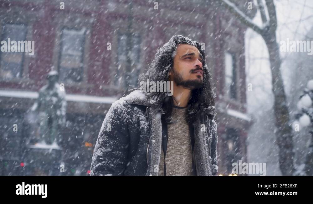 An ORBITING CLOSEUP of a Young Indian Man Looking in Awe at Historic ...