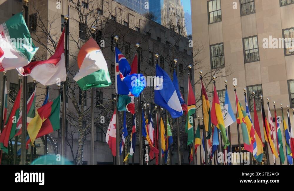 International flags from around the world. Pan line of flags blowing in ...