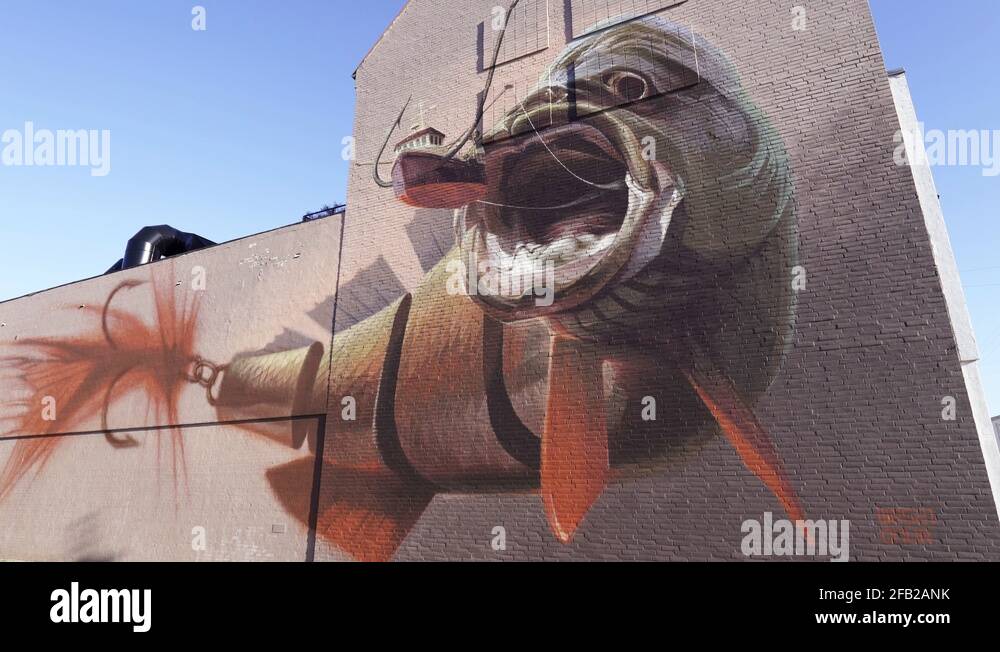Street art / Graffiti by Wes21 and Onur of a giant fish made to sushi ...