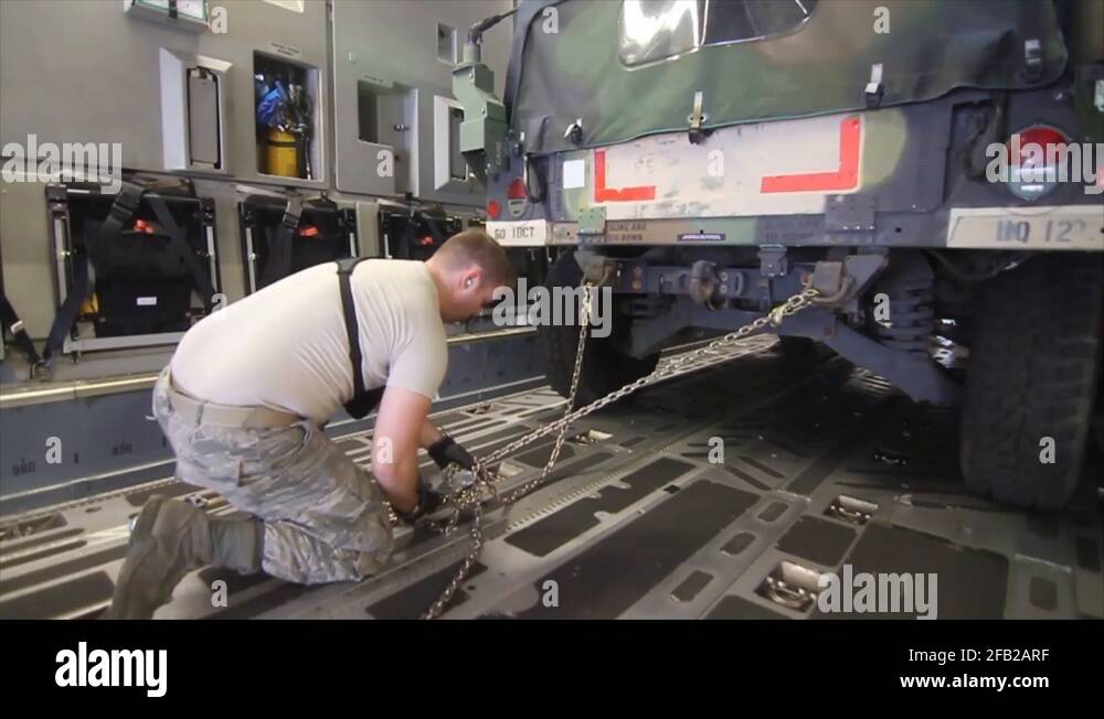 Soldier load vehicle into C-17 Globemaster during a deployment exercise ...