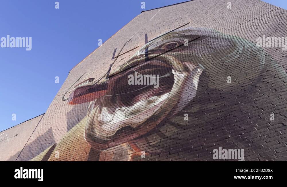 Street art / Graffiti by Wes21 and Onur of a giant fish made to sushi ...