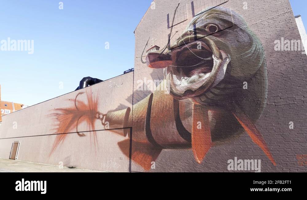 Street art / Graffiti by Wes21 and Onur of a giant fish made to sushi ...