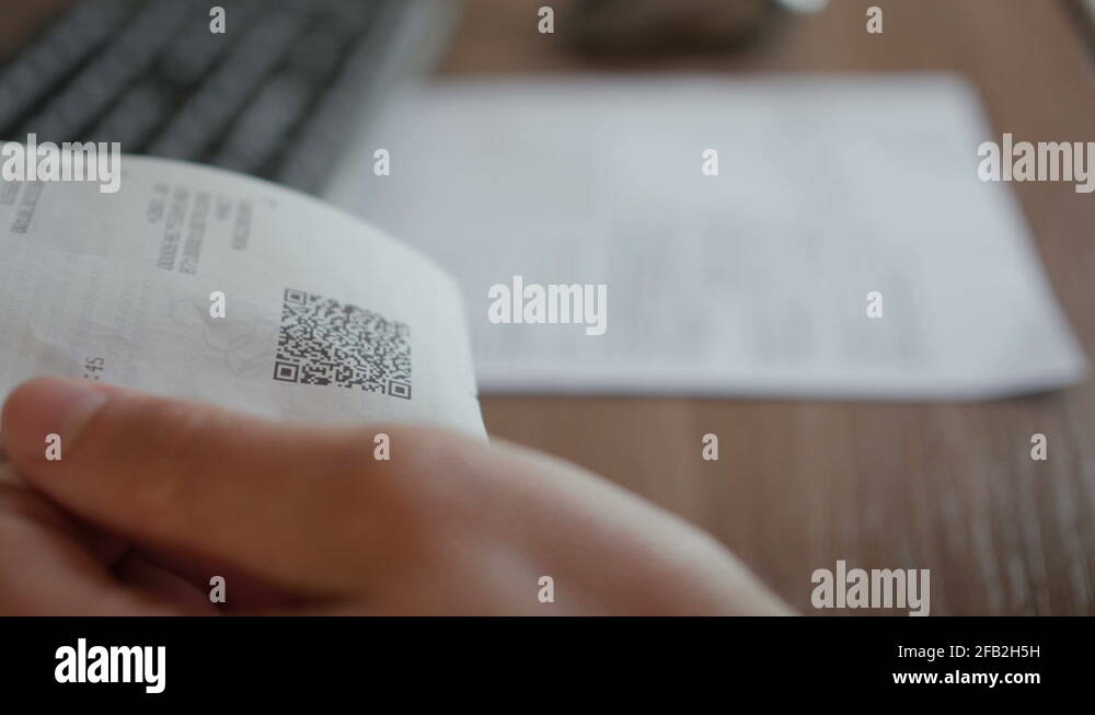 A man scans the QR code on a check from a supermarket Stock Video ...