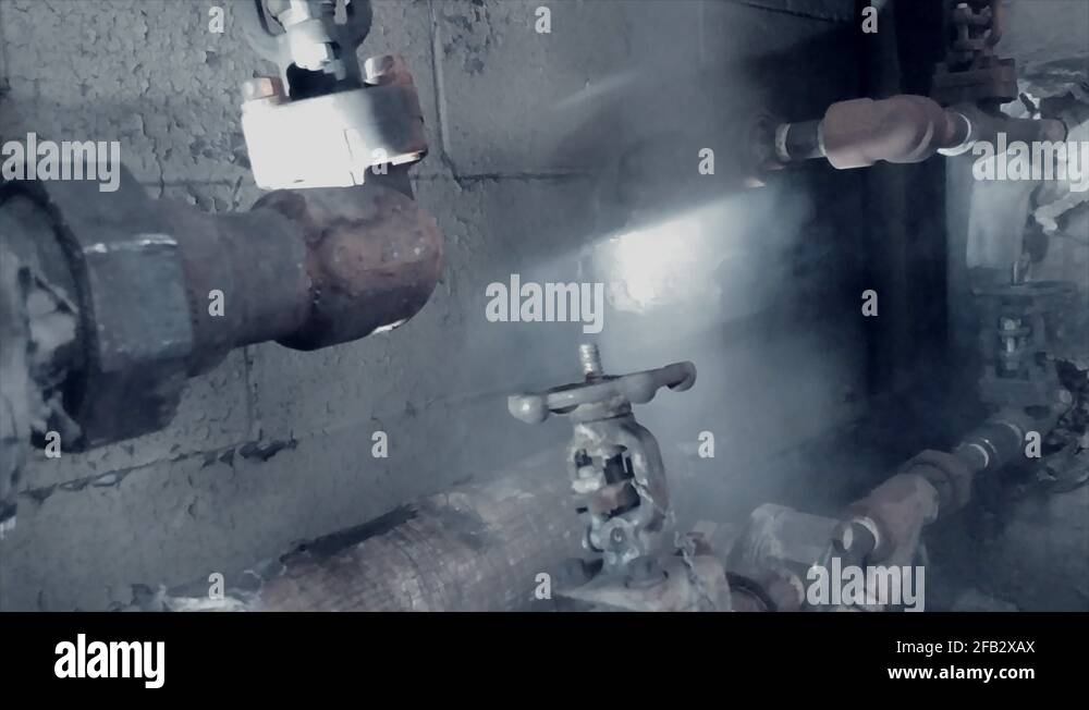 Steam leaking from pipes and valve Stock Video Footage - Alamy