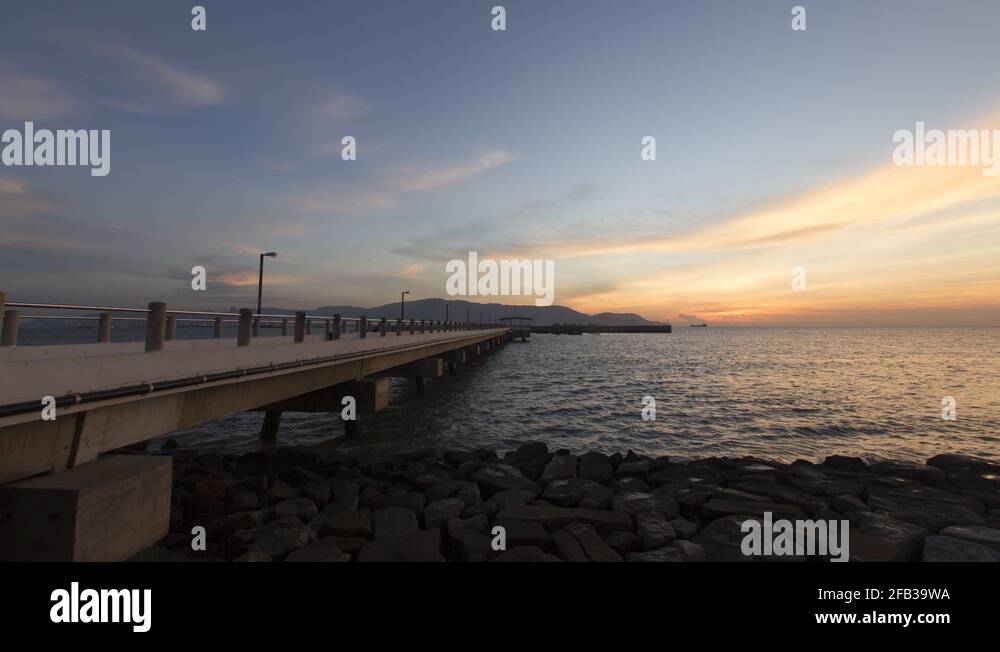 Timelapse sunset at Jetty Pantai Bersih Keris Tuah Stock Video Footage ...