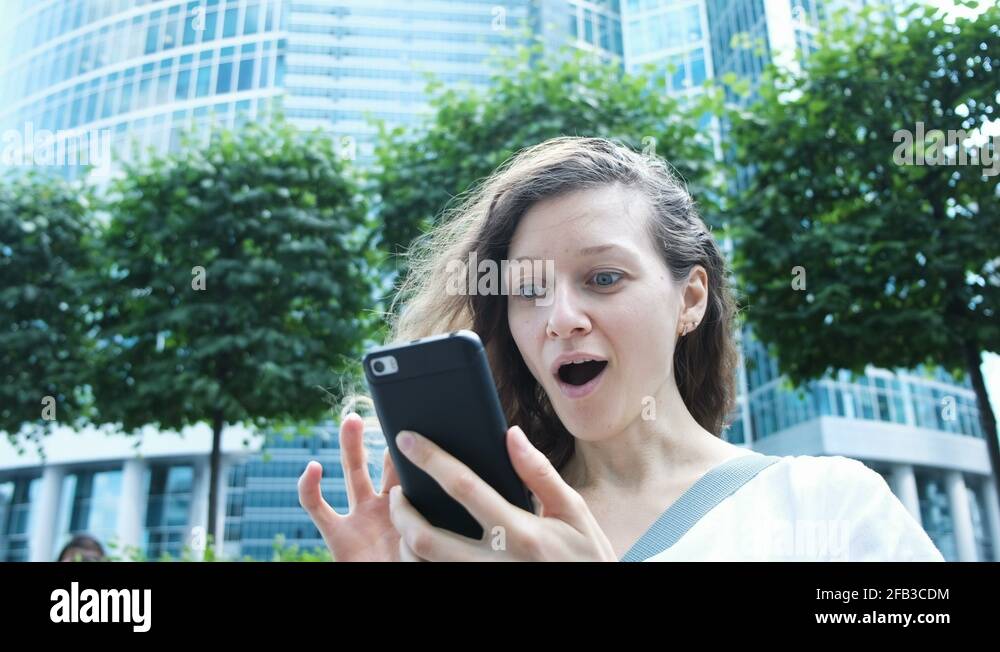 Woman surprise phone Stock Videos & Footage - HD and 4K Video Clips - Alamy