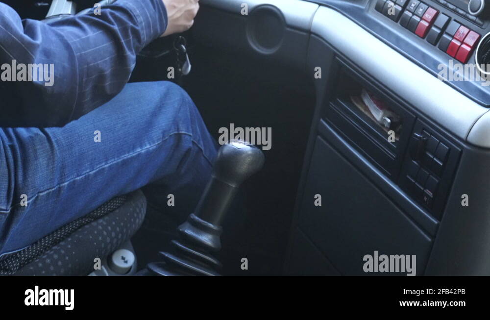 Bus driver behind the wheel of long-distance coach. Man driving ...