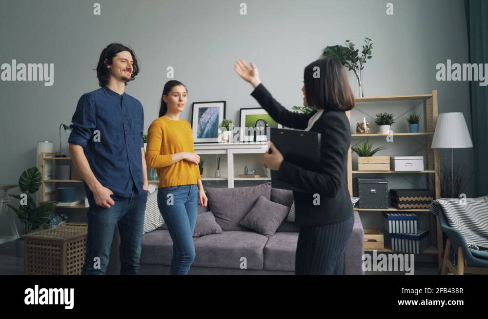 Agent showing around house Stock Videos & Footage - HD and 4K Video ...