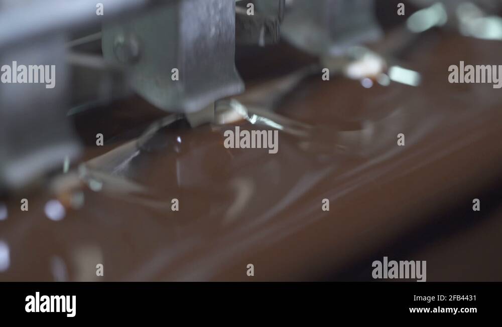 ice cream production, chocolate coating process on ice cream ...