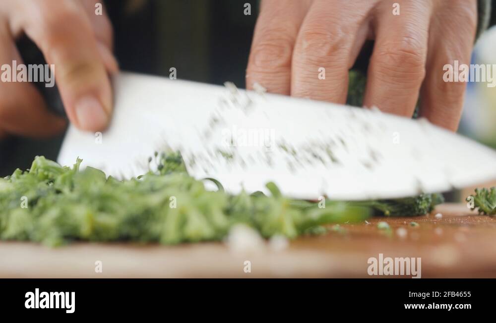 Chopping broccoli Stock Videos & Footage - HD and 4K Video Clips - Alamy