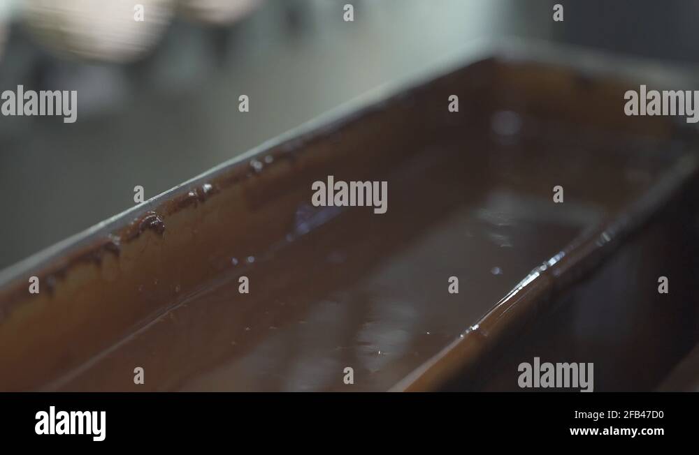 ice cream production, chocolate coating process on ice cream ...