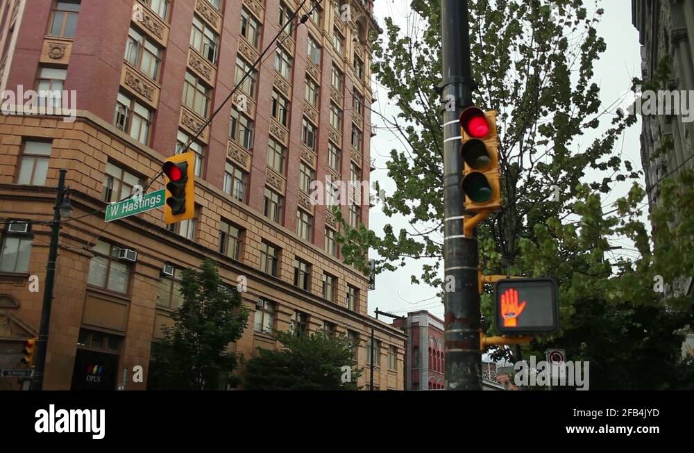 Traffic Light Turns from Red To Green In Downtown Area Stock Video ...