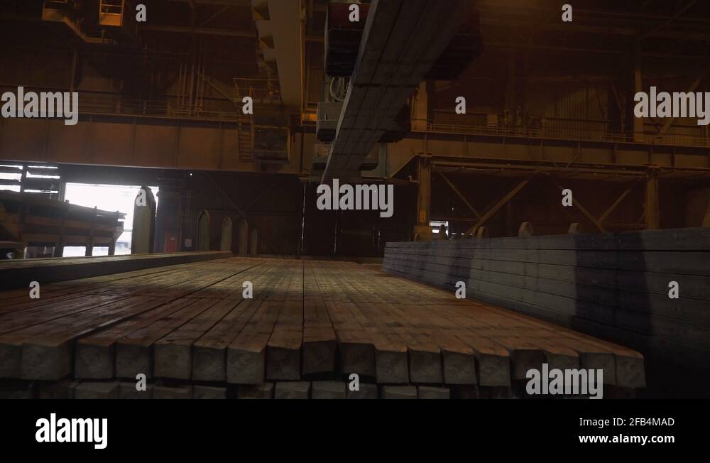 Steelmaking, the process of loading steel bars into a warehouse steel ...