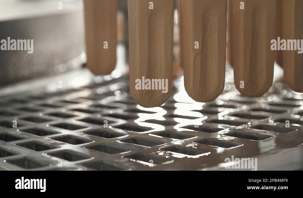 ice cream production, glaze coating process on ice cream, production ...
