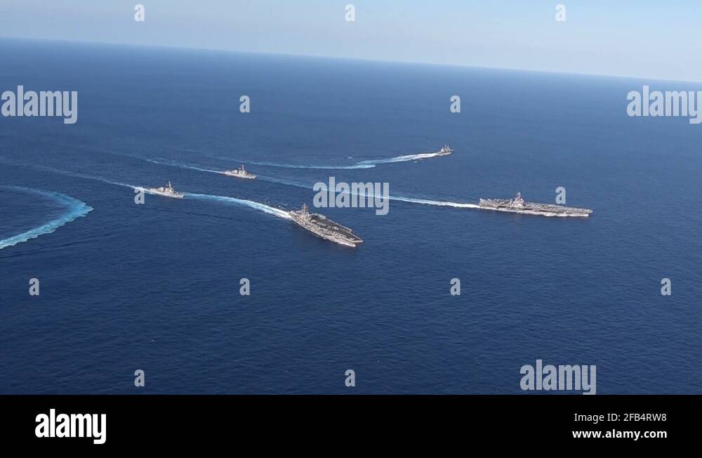 CVN 76 and CVN 74 sailing during dual carrier strike force exercise ...