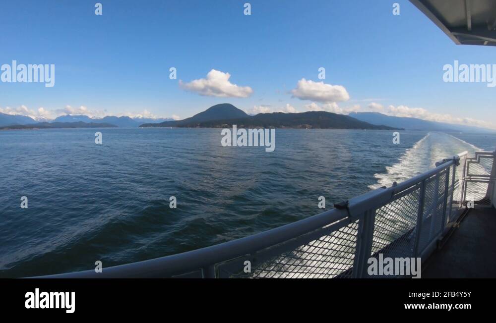 mountain islands from boat, tail wave of cruise ship, ferry boat wave ...