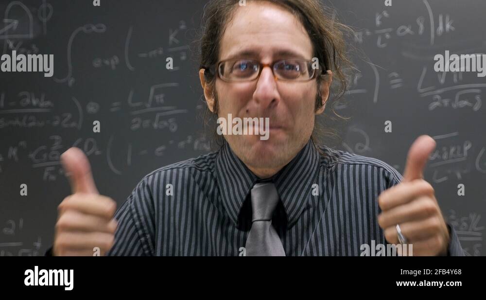 Nerdy, smart man laughing, smiling and giving two thumbs up Stock Video ...