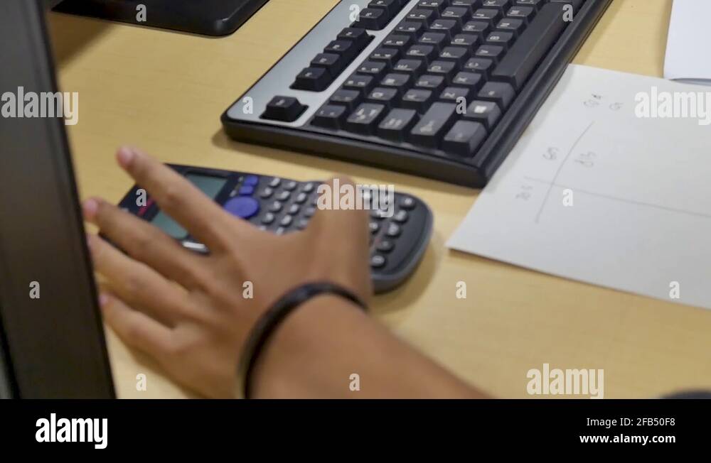 Doing calculation Stock Videos & Footage - HD and 4K Video Clips - Alamy