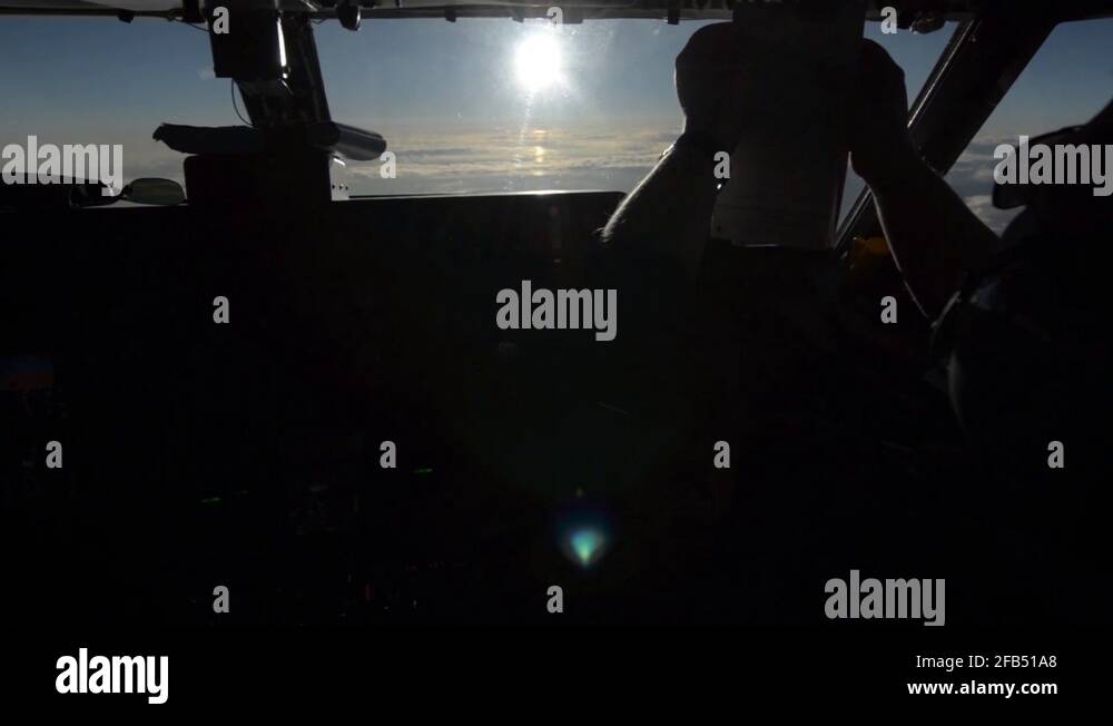 Pilot and copilot in cockpit during boom operator - 2013 Stock Video ...