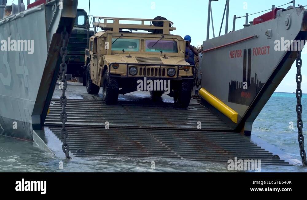 Soldiers loading military vehicle on Landing Craft Unit - 2018 Stock ...