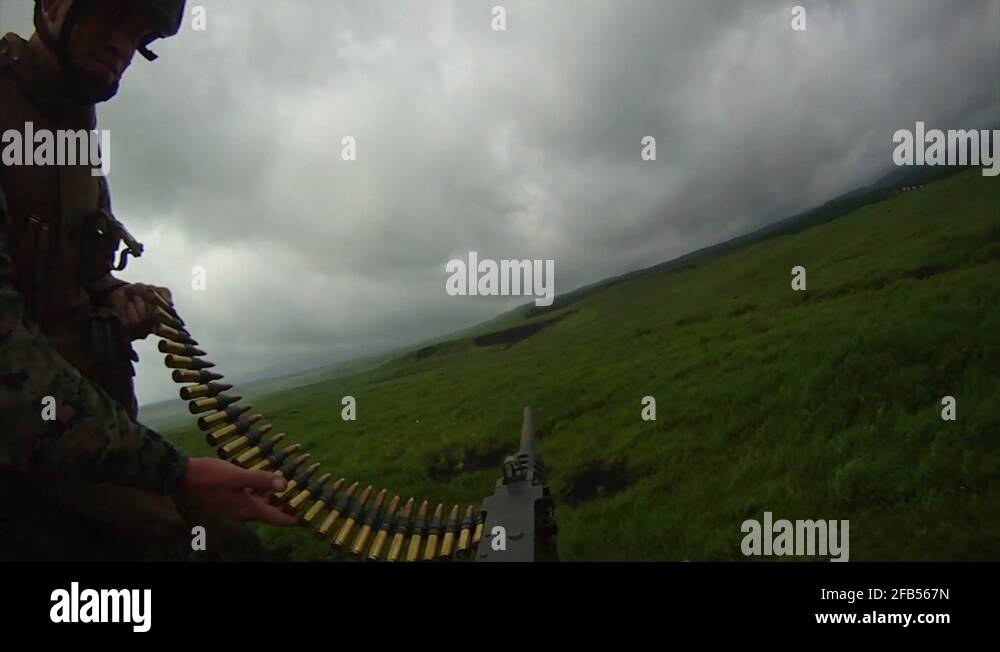 Marine firing M-2 .50-caliber heavy machine gun during Dragon Fire ...