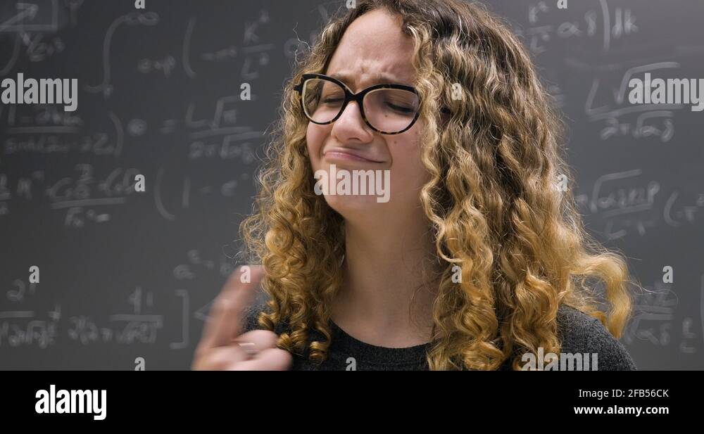 Young smart woman proud of her achievements solving a complex problem ...