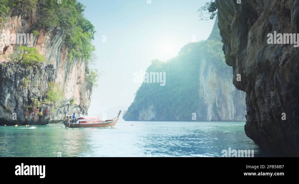 long boat and small Koh Lao Lading island, Thailand Stock Video Footage ...
