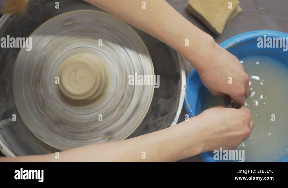 A close up video of pottery making process. A skilful master / potter ...
